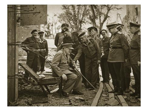 Winston Churchill sitting in the remains of Hitler's armchair, July ...
