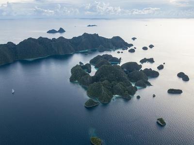 'A bird's eye view shows dramatic limestone islands rising from the ...