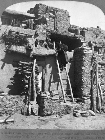 'A Moki Squaw Carries Water Up a Ladder to Her Pueblo' Giclee Print ...