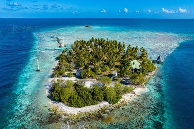 'Aerial of a little island at the Avatoru Pass, Rangiroa atoll ...