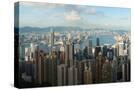 Aerial view of Hong Kong skyline and Victoria Harbor with blue sky in ...