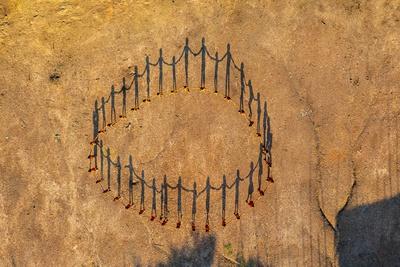 'Aerial view of Yanomami tribe, in a circle, and shadows, southern ...