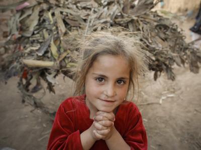 'Afghan Refugee Child Looks on in a Neighborhood of Rawalpindi ...