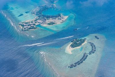 Amazing atoll and island in Maldives from aerial view. Tranquil ...