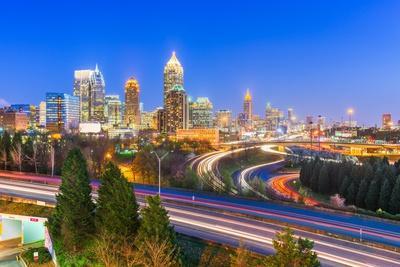 'Atlanta, Georgia, USA downtown city skyline over highways at night ...