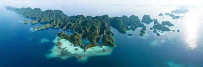 'Biodiverse coral reefs surround the dramatic limestone islands that ...