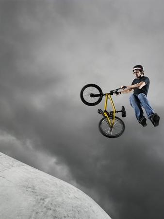 'BMX Biker Performing Tricks' Photographic Print | AllPosters.com