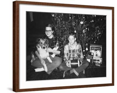 'Brother and Sister Pose by the Christmas Tree, Ca. 1960' Photographic ...