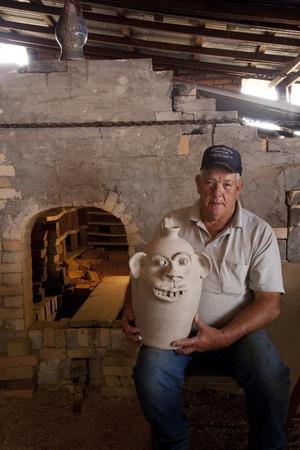 'Clay Pottery Craftsman' Photo | AllPosters.com