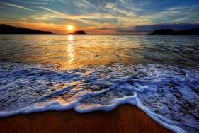 'Colorful Seaside Beach Sunrise with Distant Mountains' Photographic ...