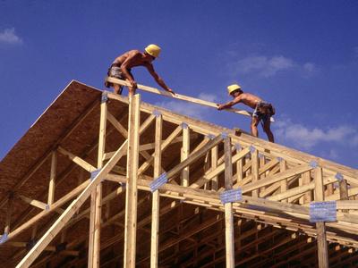 'Construction Workers Framing a House' Photographic Print - Bill ...