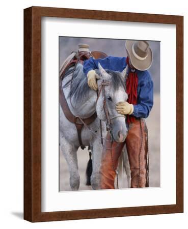 'Cowboy Leading and Stroking His Horse, Flitner Ranch, Shell, Wyoming ...