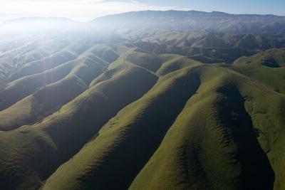 'Early morning light shines on the scenic, rolling hills and valleys of ...