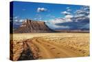 'Factory Butte, isolated flat-topped sandstone mountain in Utah desert ...
