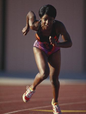 'Female Runner at the Start of a Track Race' Photographic Print ...