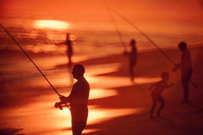 'Fishermen Cast their Lines into the Surf at Sunset. Smith Point ...