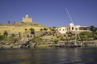 View of the Nile river and Aga Khan Mausoleum from small boat in Aswan ...