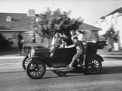 'George Sutton and His Family Riding on a 1921 Model T Ford ...