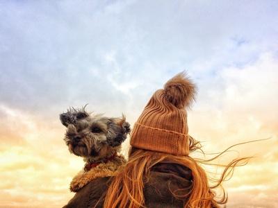 'Girl in Wooly Hat Holding Her Dog on a Windy Day' Photographic Print ...