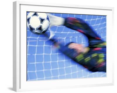 'Goalie Attempting to Stop a Soccer Ball' Photographic Print ...