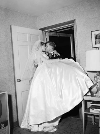 'Groom Carrying Bride over Threshhold' Photographic Print - Philip ...