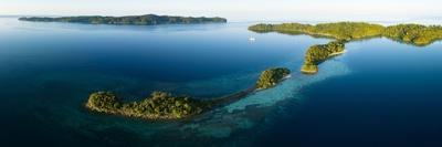 Healthy fringing coral reefs grow around the beautiful islands that ...