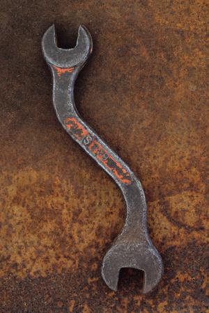 'Heavy Double-headed Spanner with Bend in Handle Lying On Rusty Metal ...