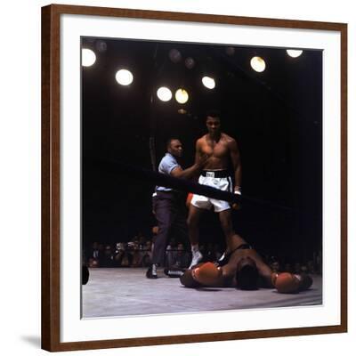 'Heavyweight Boxer Cassius Clay, aka Muhammad Ali, Standing over ...