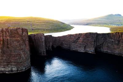 'Incredible view of Sorvagsvatn lake on cliffs of Vagar island in sunset time, Faroe Islands ...