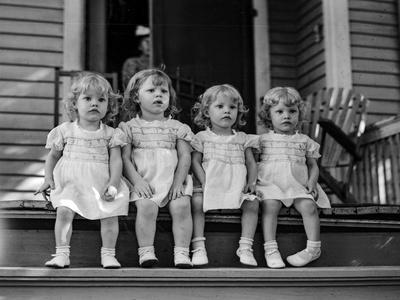 'Four Young Girls Posing for Portrait including Three Triplets and a ...