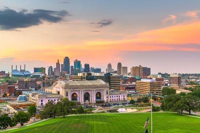 Kansas City, Missouri, USA downtown skyline with Union Station at dusk ...