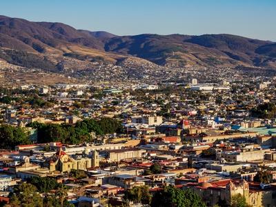 Cityscape seen from Cerro del Fortin at sunset, Oaxaca de Juarez ...