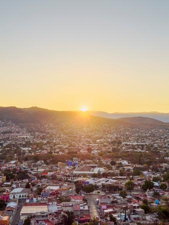 Cityscape seen from Cerro del Fortin at sunset, Oaxaca de Juarez ...
