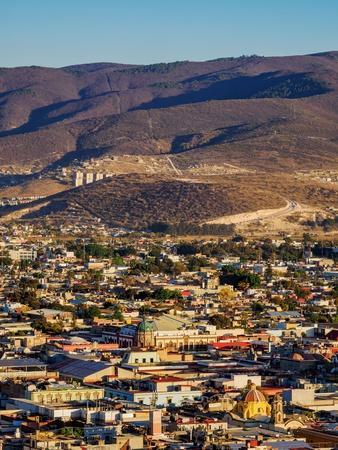 Cityscape seen from Cerro del Fortin at sunset, Oaxaca de Juarez ...