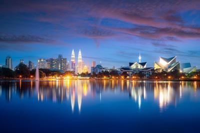 Kuala Lumpur city skyscraper and fountation with nice sky twilight at ...