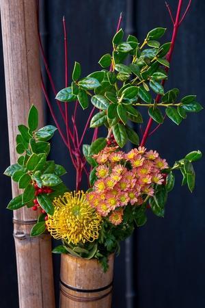 'Japanese flower arrangement, with pincushion protea and chrysanthemums ...