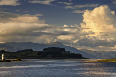 'Lismore Island and lighthouse on Lynn of Lorn, Highlands, Scotland, UK ...