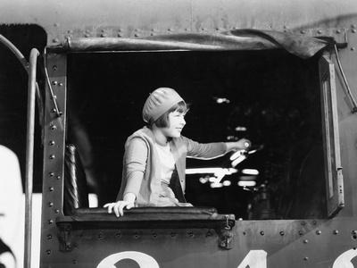 'Little Girl in a Beret Driving a Train' Photo | AllPosters.com
