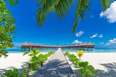 Luxury travel destination. Amazing summer beach landscape, water villas ...