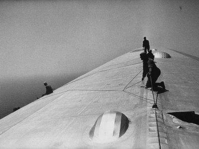 'Maintenance Crewmen on Top of Graf Zeppelin repair damage caused ...