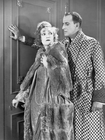 'Man Holding Door Shut as Woman Tries to Leave' Photo | AllPosters.com