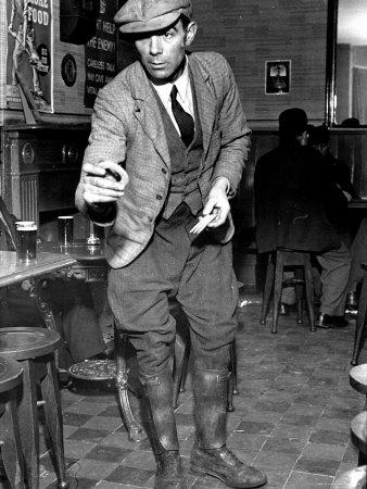 'Man Playing Quoits, Like Horse Shoes, in an English Pub' Photographic ...