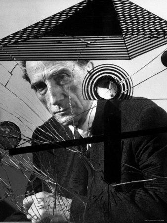 'Marcel Duchamp Sitting Behind Example of Dada Art' Premium ...