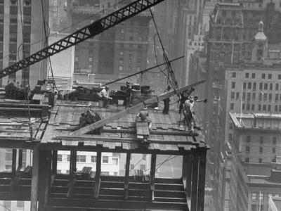 Men Working on New Skyscraper, with One Waving to People Below ...