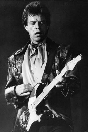 'Mick Jagger on Guitar' Photo - Associated Newspapers | AllPosters.com
