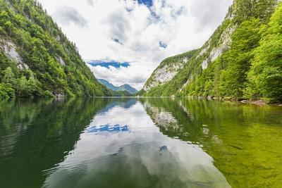 Mountain lake landscape, beautiful scenery with clouds and pine trees ...