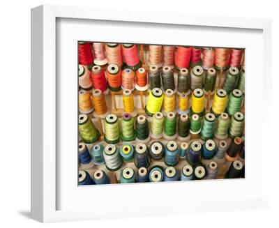 'Multi-colored thread in high school sewing class' Photographic Print ...