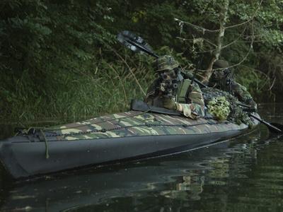 'Navy SEALs Navigate the Waters in a Folding Kayak During Jungle ...