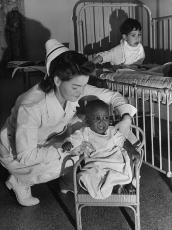 'Nurse in Pediatric Ward at Sydenham Hospital' Photographic Print ...