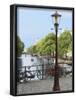 'Old Gas Lamp Post and Bicycles on a Bridge over a Canal in Amsterdam ...